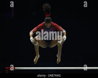 Shilese Jones of USA (women's uneven parallel or asymmetric bars ...