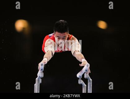 October 9, 2019: Chaopan Lin of China competing in parallel bars for ...
