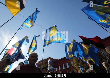 Ukrainians participate a march under the flags of far-right Svoboda ...