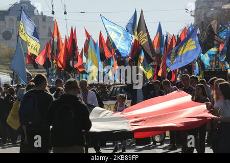 Ukrainians participate a march under the flags of far-right Svoboda ...