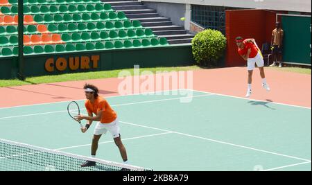 Tunisians Aziz Dougaz and Skander Monsouri pose with trophy after ...