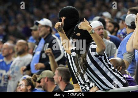 Detroit Lions Fans dressed as officials watch the game during the ...