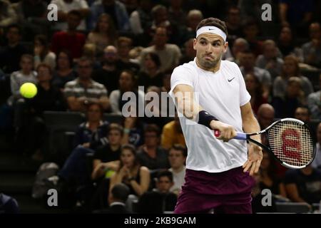 Bulgaria's Grigor Dimitrov hits a ball during the men's singles round ...