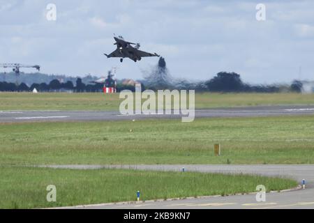 A pilot is seen in a Rafale fighter jet, after landing in Tanagra Air ...