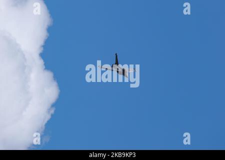 A pilot is seen in a Rafale fighter jet, after landing in Tanagra Air ...