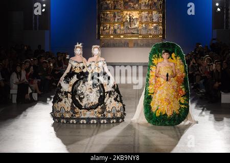 Models walk the runway during Guo Pei's first ever runway show in the ...