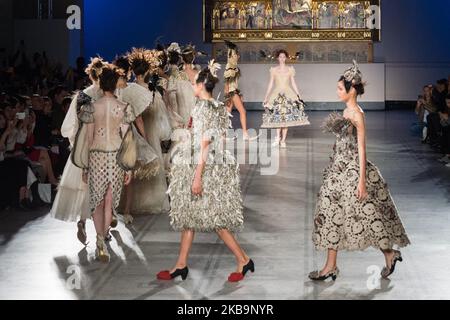 Models walk the runway during Guo Pei's first ever runway show in the ...