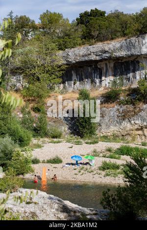 Collias, France, August 11, 2019. Swimmers along the gorges of the ...