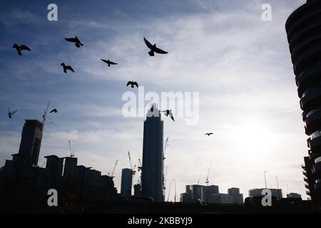 The cylindrical form of the St George Wharf Tower, seen through fencing ...