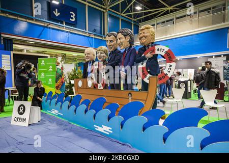 Oxfam activists make a performance with costumes like Justin Trudeau ...