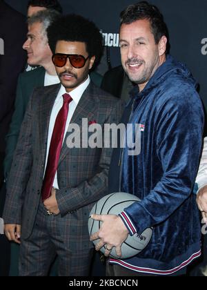 (L-R) The Weeknd and Adam Sandler at the UNCUT GEMS Los Angeles ...