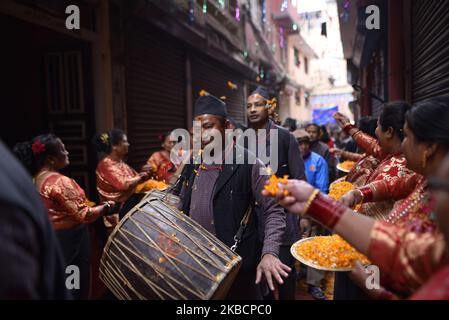 People from Newar community playing traditional instruments during a ...