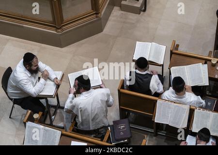 Jews studying inside the Hurva Synagogue in the city of Jerusalem ...