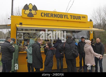 Visitors stand next to a souvenir shop on the Dytyatky checkpoint in ...