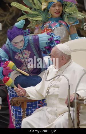 Pope Francis looks at artists of the "Aqua" Cuban circus during his ...