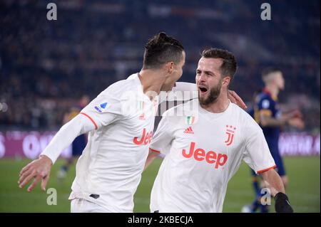 Cristiano Ronaldo of Juventus celebrates with Miralem Pjanic after ...