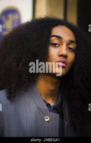 People attend Street Style: January 13 - Milan Men's Fashion Week Fall ...