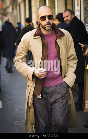 People attend Street Style: January 13 - Milan Men's Fashion Week Fall ...