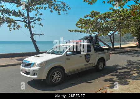 Cambodian Police car seen in the main shopping street in Kampot center ...