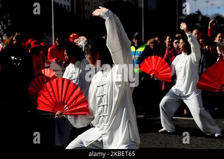 Revelers perform during celebrations for the Chinese New Year parade ...