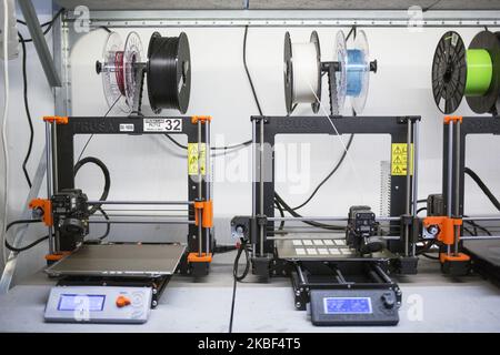 Original Prusa I3 MK3S 3D printer pictured printing various 3D tasks in ...
