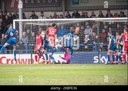 Jordan Roberts of Gillingham FC heads the ball and scores a goal during ...
