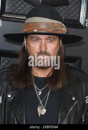 Billy Ray Cyrus arrives at the 62nd Annual Grammy Awards red carpet ...