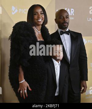 Tim Weatherspoon, Titan Jewell Weatherspoon, and Kelly Rowland attend ...
