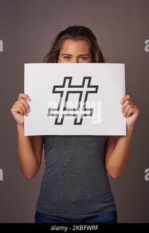 I have something to say. a young woman showing middle finger against a ...