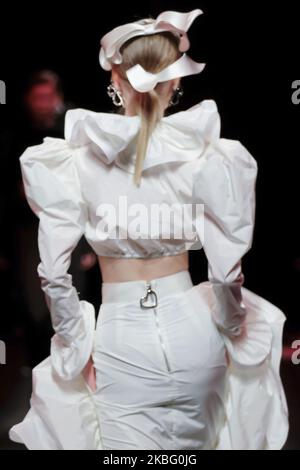 A model walks the runway at the JUAN VIDAL fashion show during Mercedes ...