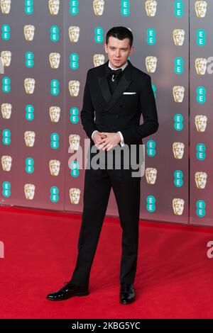 Asa Butterfield attends the EE British Academy Film Awards in 2020 at ...