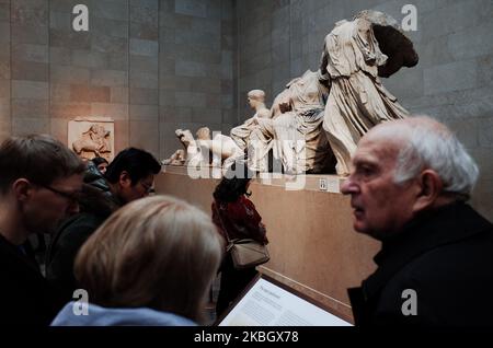 Visitors look at the Parthenon Marbles, also known as the Elgin Marbles ...