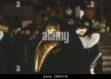 VENICE, ITALY - FEBRUARY 25: Plague doctors pose in Venice on February ...