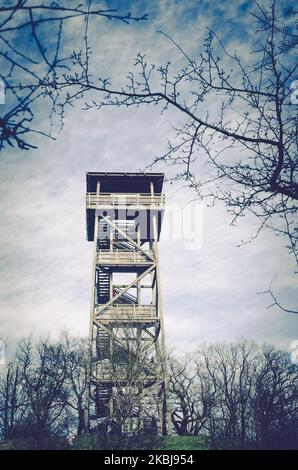 high wooden observation tower with dramatic sky Stock Photo - Alamy