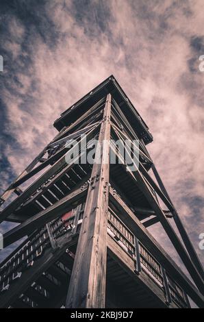 high wooden observation tower with dramatic sky Stock Photo - Alamy