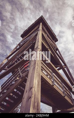 high wooden observation tower with dramatic sky Stock Photo - Alamy