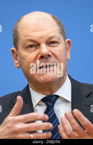German Finance Minister Olaf Scholz addresses the media during a press ...