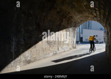 A Glovo currier seen in Krakow city center. On Wednesday, August 4 ...