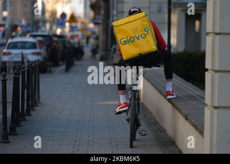 A Glovo currier seen in Krakow city center. On Wednesday, August 4 ...