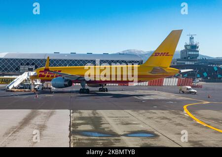 A DHL Boeing 757 200 landing on a runway Stock Photo - Alamy
