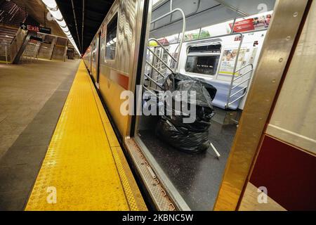 A view of a homeless person’s property on a subway train in Main Street ...