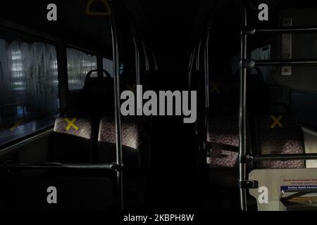 'X' marks for social distancing are seen inside the bus in the morning ...
