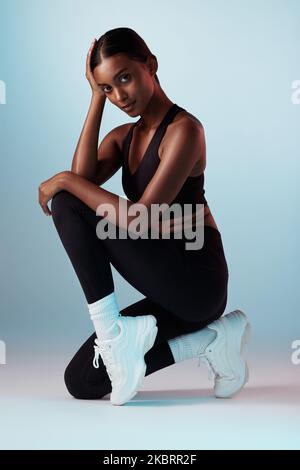 Female fitness model with toned body working out with weights, UK Stock ...