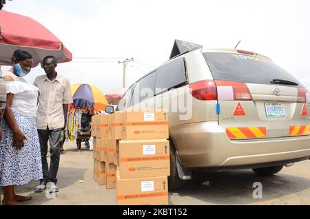 Travelers arriving at at Opebi/Onigbongbo branch B Owena park Ojota bus ...