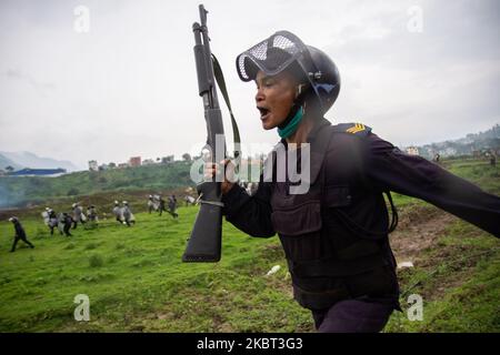 Nepalese policemen disperse demonstrators during a protest that turned ...