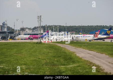 Low cost Wizz Air and Ryanair planes sitting on airport are seen at ...