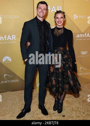 Robin Gadsby and Katee Sackhoff arrive at the amfAR Gala Los Angeles at ...