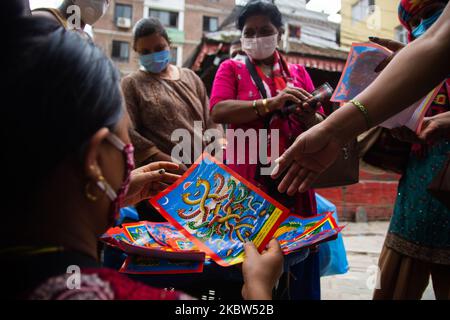 Nepalese people buys Nag Poster for the celebration of Nag Panchami at ...