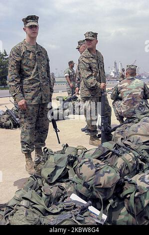 June 24, 2003-Pohang, South Korea-US Marines wait for their Air-cushion ...