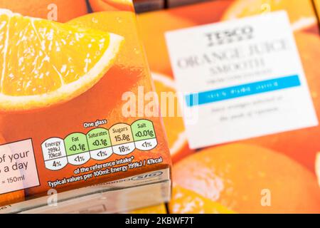 Close shot of food Dietary Traffic Lights on cardboard box of Tesco own ...